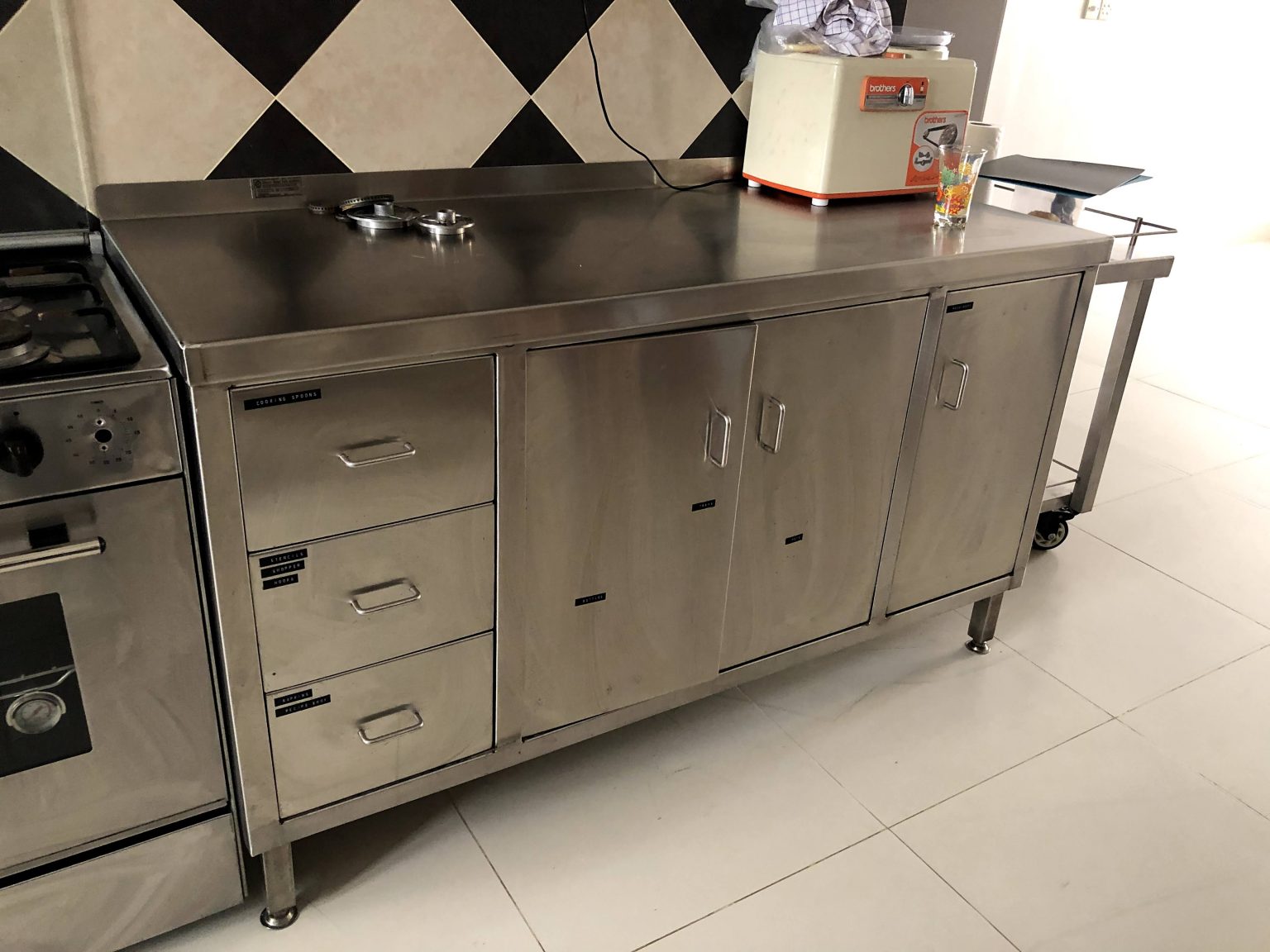 Counter with 4 drawers and flap doors - Moon Steel Fabricators